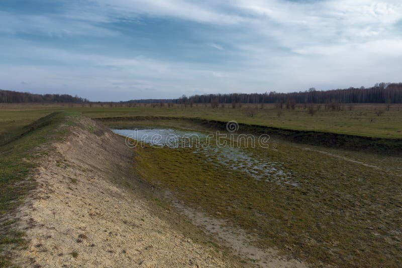 The Exposed Bottom of a Dry Pond. a Shallow Water Body Stock Image ...