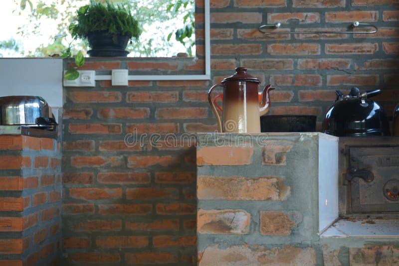 Exposed Brick Table and Kettle Stock Image - Image of table, ceramic ...
