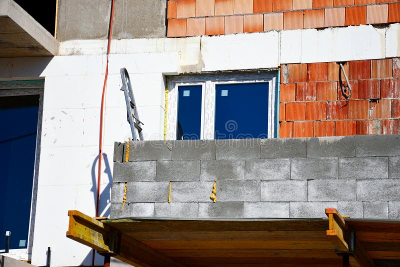 Exposed Concrete and Clay Block Structure. Steel Scaffolding Stock ...
