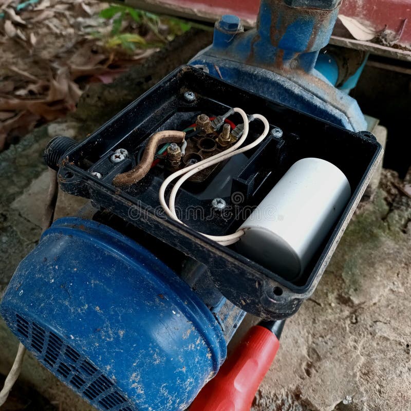 Exposed Electric Pump Wiring and Capacitor Assembly Stock Photo - Image ...