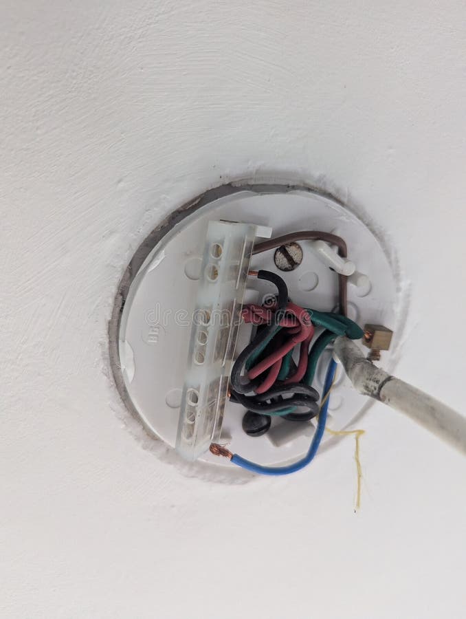 Exposed Electrical Wiring and Terminal Block for a Ceiling Light ...