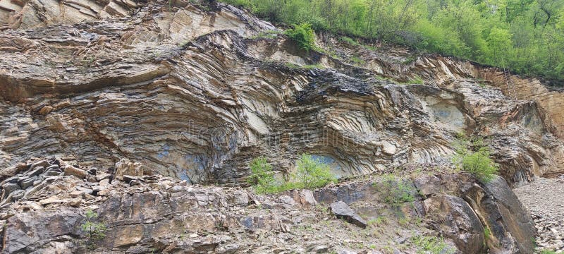 Exposed Folded Rock Layers in a Geological Notch Stock Photo - Image of ...