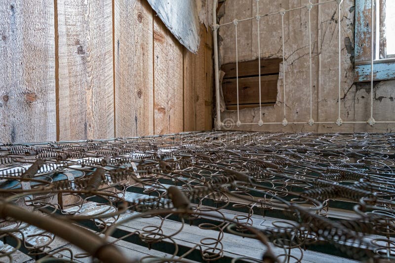 The Exposed Mattress Springs on an Antique Bed Frame Stock Photo ...