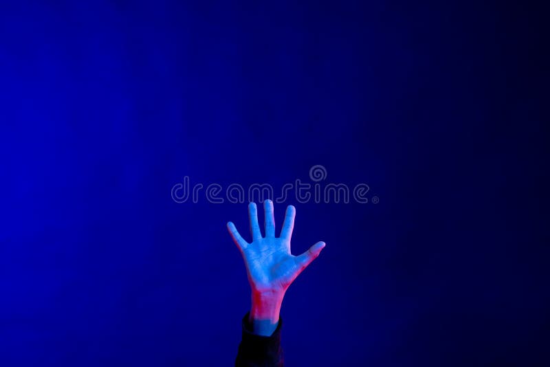Exposed Open Hand in Studio with Blue Light with Copy Space Stock Image ...