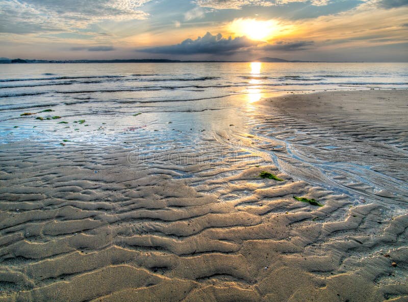 Exposed Rippled Beach stock image. Image of flats, reflection - 6592415