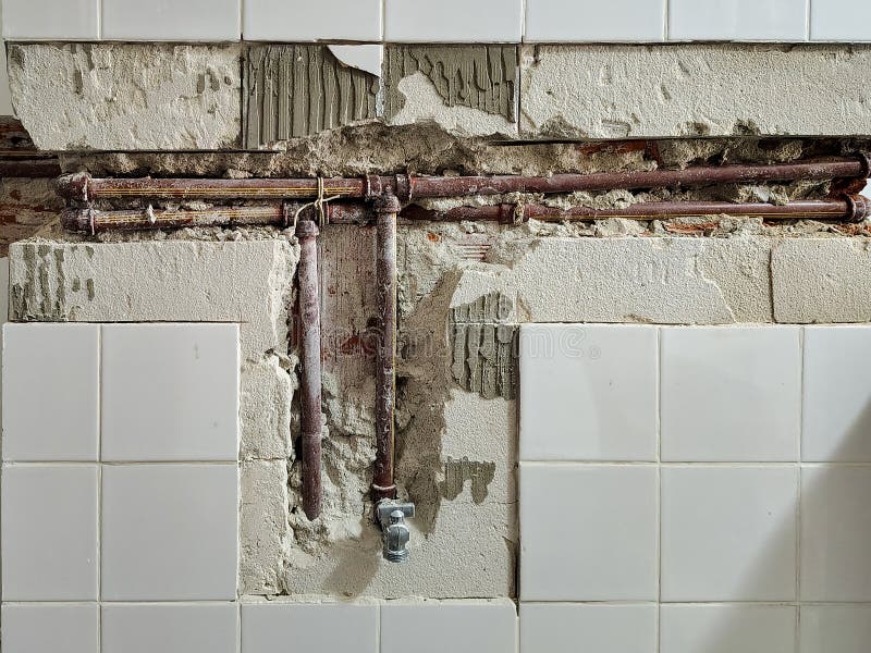 Exposed Section of a Wall Undergoing Plumbing Work Stock Image - Image ...