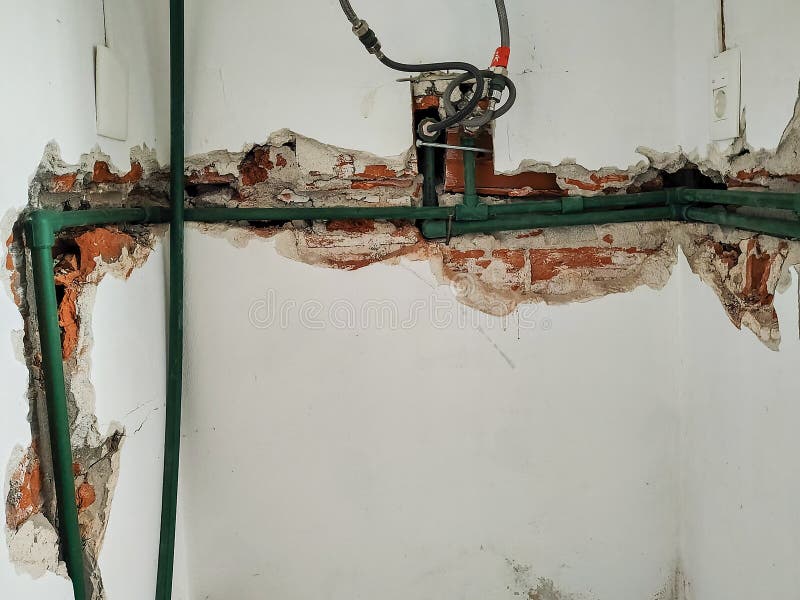 Exposed Section of a Wall Undergoing Plumbing Work Stock Photo - Image ...