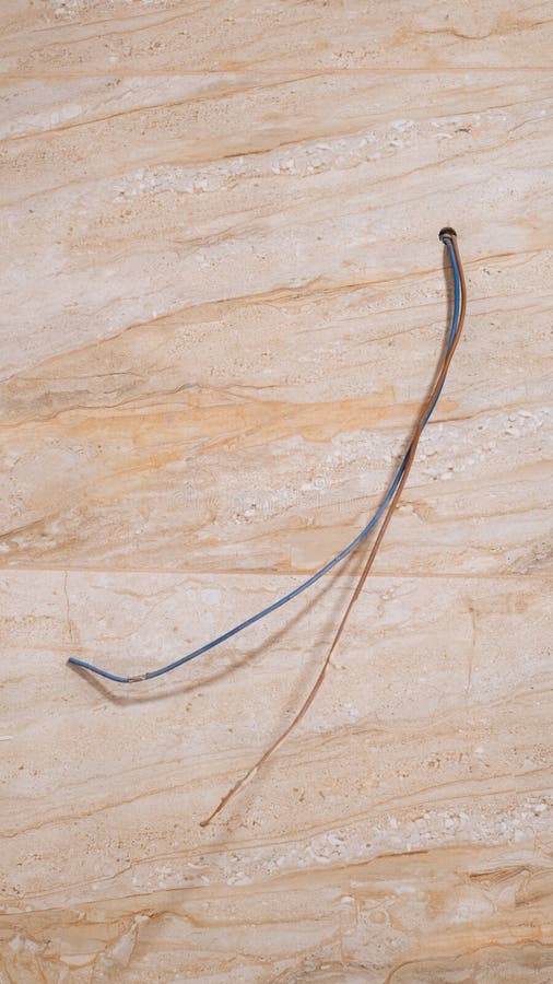 An Exposed Wire Sticking Out of the Wall Stock Image - Image of wires ...
