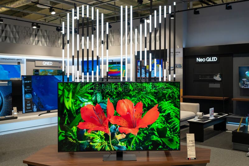 Exposition of 8K TVs of Different Brands in an Electronics Store. Minsk ...