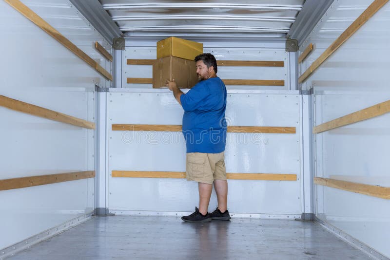 Delivery Boxes Man Holding in Boxes with Moving Car Stock Image - Image ...