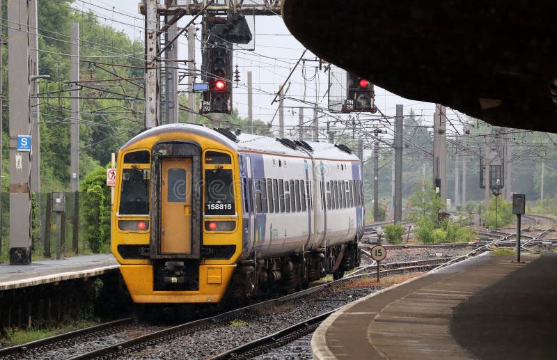 Express Sprinter Train Leaving Carnforth in Rain Editorial Stock Image ...