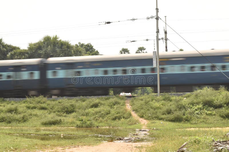 Express Train Moving on the Railway Track, Blur View with Green Grass ...