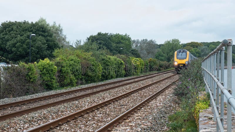 Fast Train Approaching in East Devon UK Stock Image - Image of railroad ...