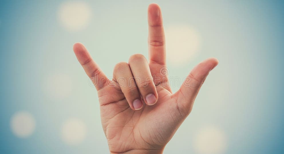Expressing Love in Sign Language on Soft Blue Background Stock Photo ...