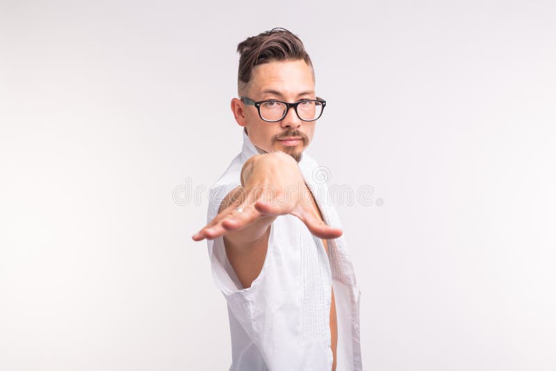 Expression and Gesture Concept - Young Man in White Shirt with His Hand ...