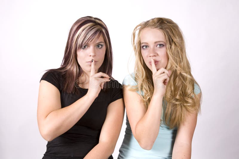 Expression two girls shhh stock image. Image of body - 11469877