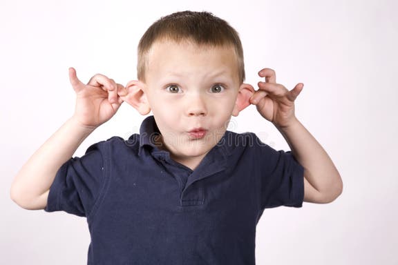 Expression Young Boy Pulling Ears Stock Image - Image of happy, home ...