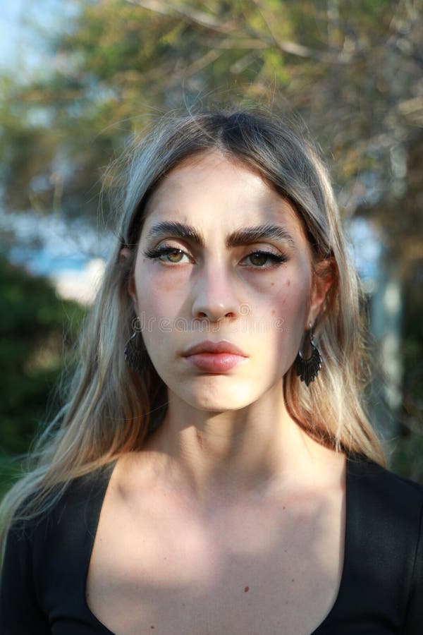 Angry Woman in a Park Standing Still Stock Image - Image of standing ...