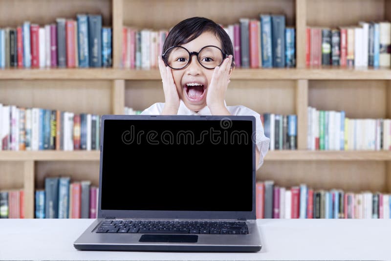 Boy screaming in library stock image. Image of globe - 58377385
