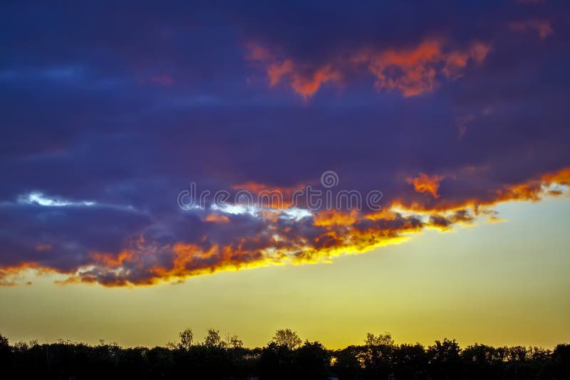 The Expressive Contrast of the Clouds in the Sky Stock Photo - Image of ...