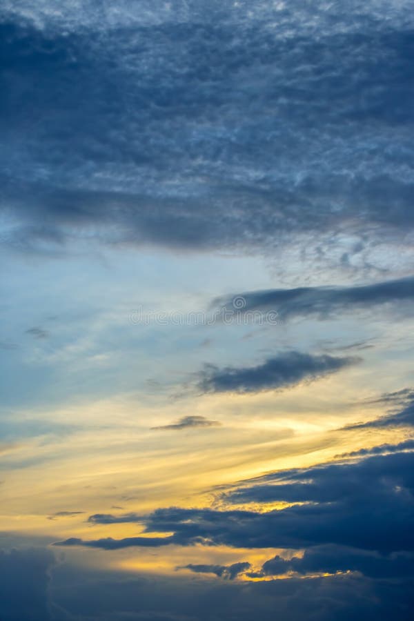 The Expressive Contrast of the Clouds in the Sky. Sunset with Bright ...