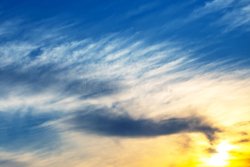 The Expressive Contrast of the Clouds in the Sky. Sunset with Bright ...