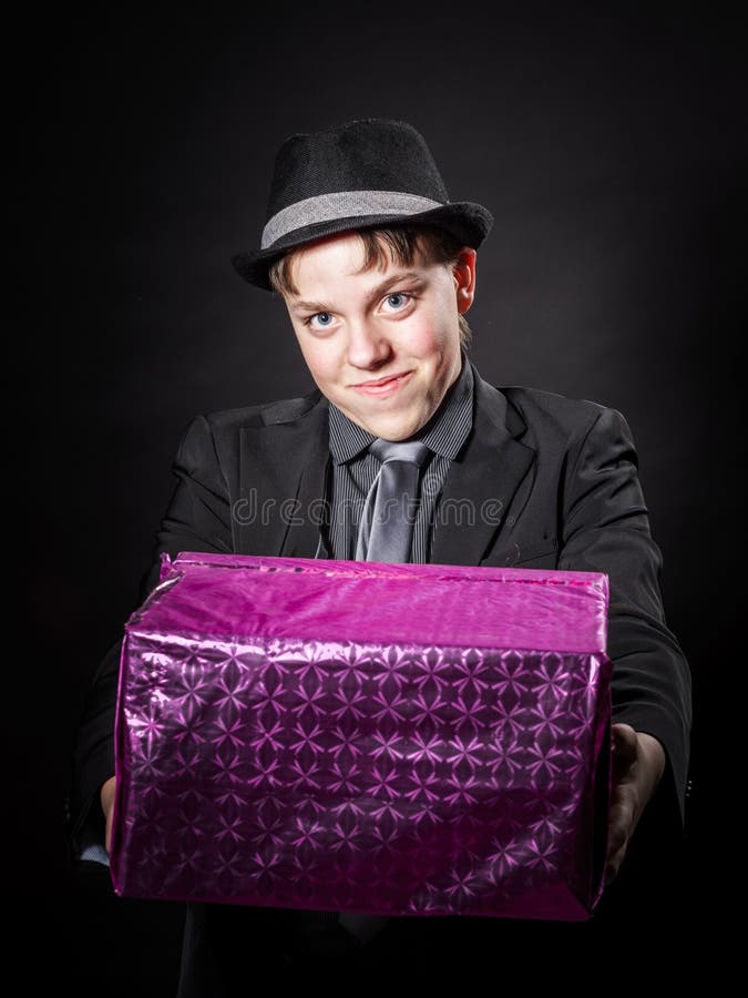 Expressive Teenage Boy Holding Box with Gift Stock Image - Image of ...
