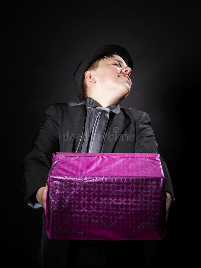 Expressive Teenage Boy Holding Box Gift Stock Photos - Free & Royalty ...