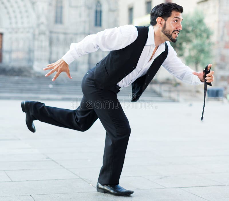 Expressive Man Running Past Old City Stock Image - Image of portrait ...