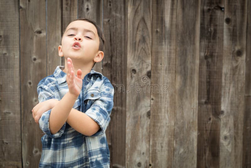 Expressive Young Mixed Race Boy Making Hand Gestures Stock Image ...