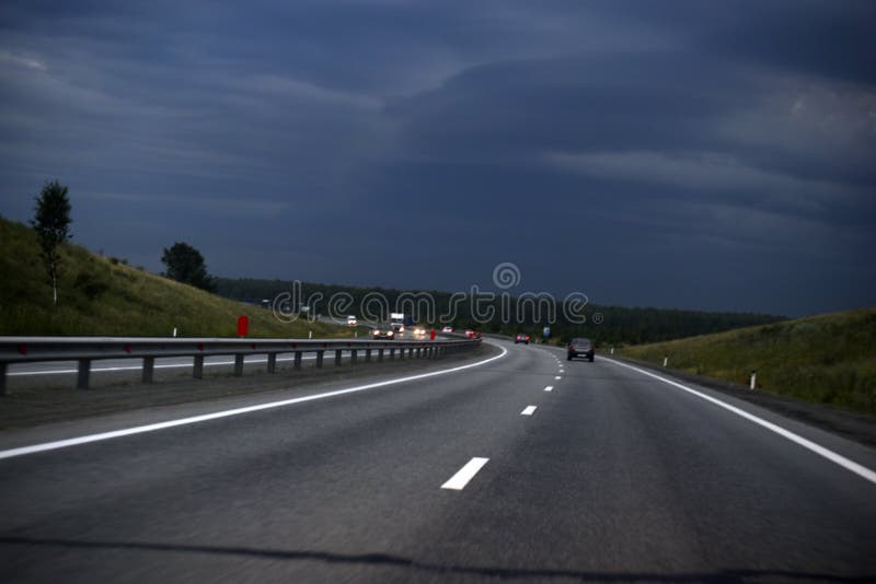 Expressway in the Evening with Cars and Scenery Stock Photo - Image of ...
