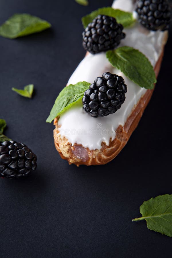 Exquisite Cream Dessert Eclair Stock Photo - Image of delicious, cream ...
