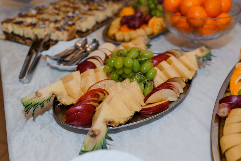 Exquisite Fruit Platter with Pineapple, Grapes, and Apples for Elegant ...