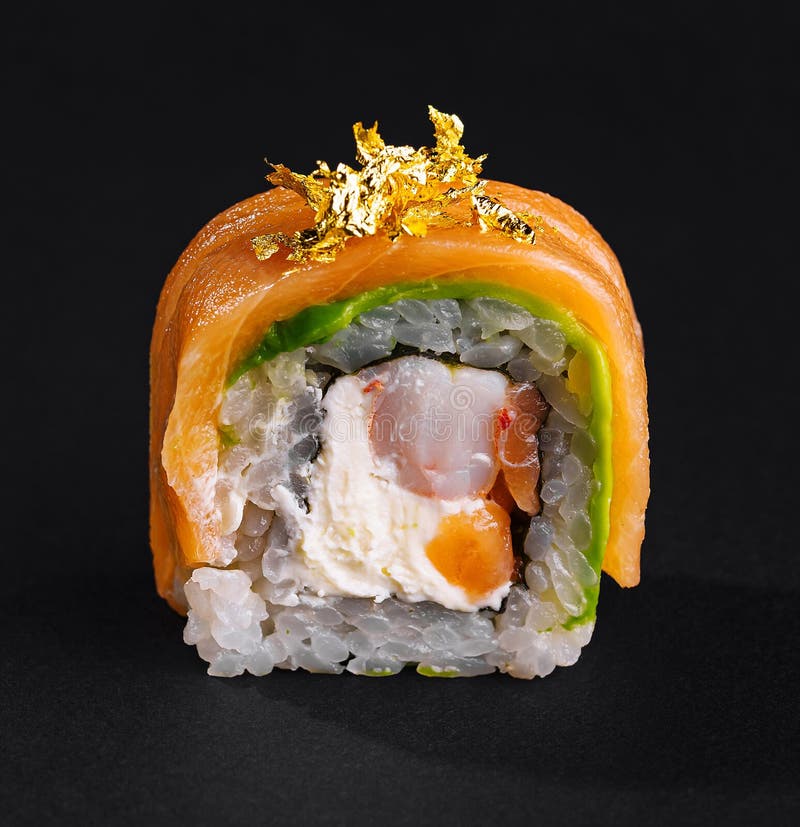 Exquisite Gold Leaf Sushi Roll on a Black Background Stock Photo ...