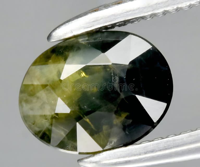 Exquisite Multifaceted Olive Green Oval Gemstone Captivating the Light ...