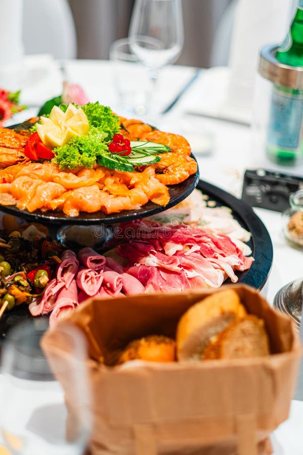 Exquisite Seafood and Meat Platter Presented Elegantly on a Stylish ...