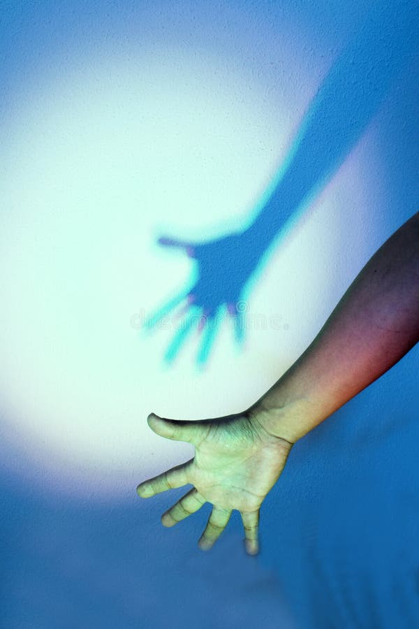 Extended arm with shadow stock photo. Image of human - 135950928