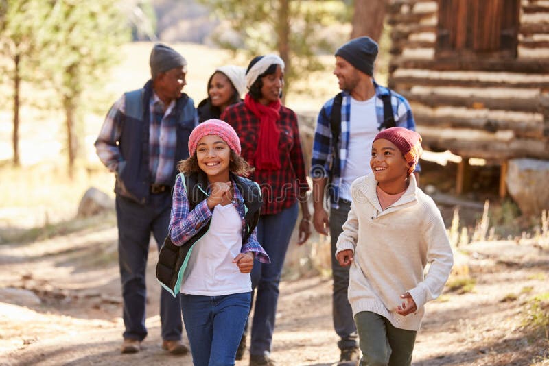 Extended Family Group on Walk through Woods in Fall Stock Photo - Image ...