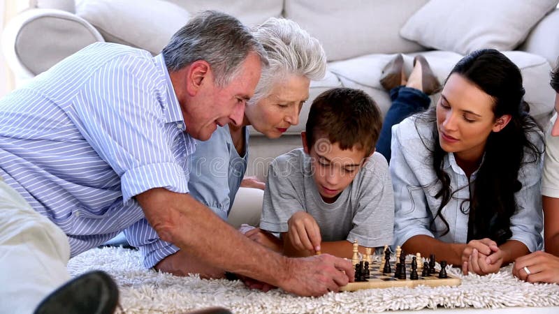 Extended Family Playing Chess Together Stock Footage - Video of ...