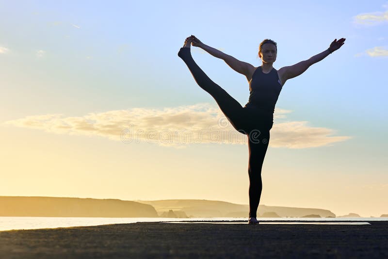Extended Hand-to-Big-Toe Pose of Young Woman Stock Image - Image of ...