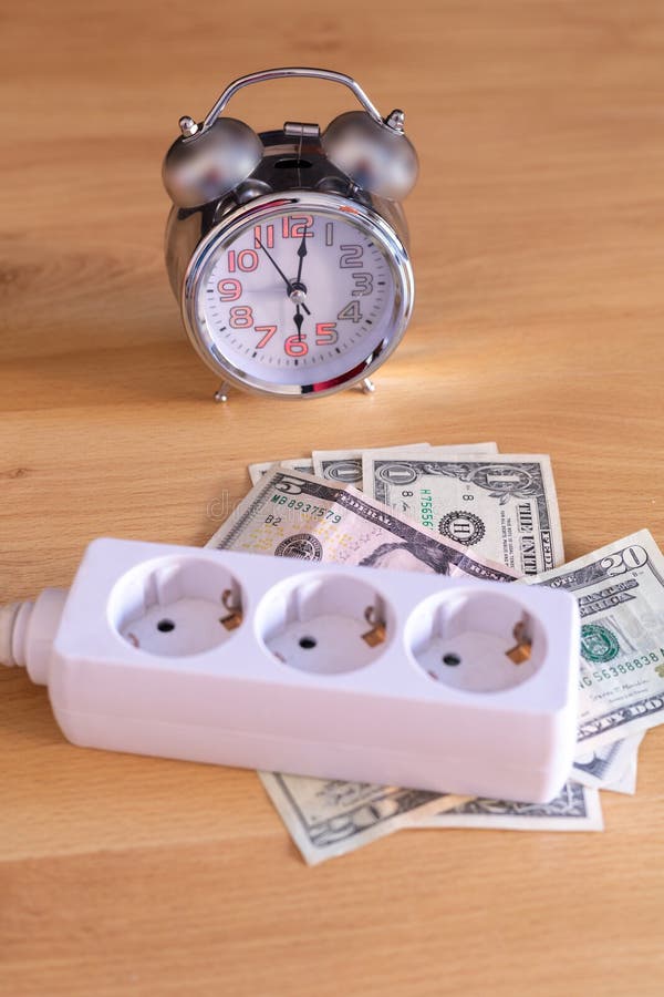 Extension Cord with Different Light Sockets Placed on Dollar Bill Money ...