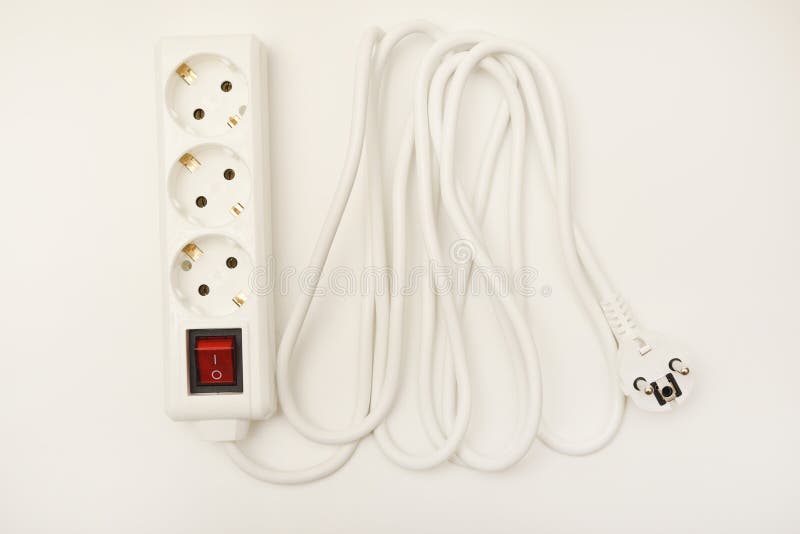 An Extension Cord with Three Sockets and a Red Switch Stock Photo ...