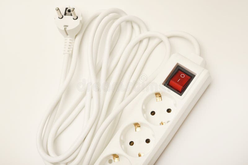 An Extension Cord with Three Sockets and a Red Switch Stock Photo ...