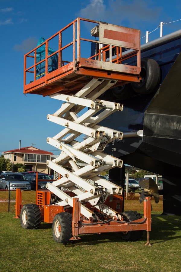 Builder on a Scissor Lift Platform at a Construction Site Stock Image ...