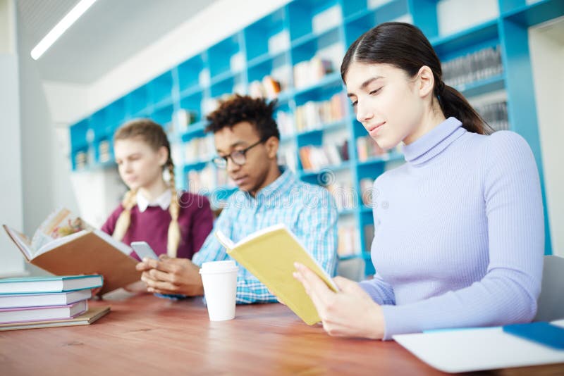 Reading in library stock image. Image of library, caucasian - 17246283