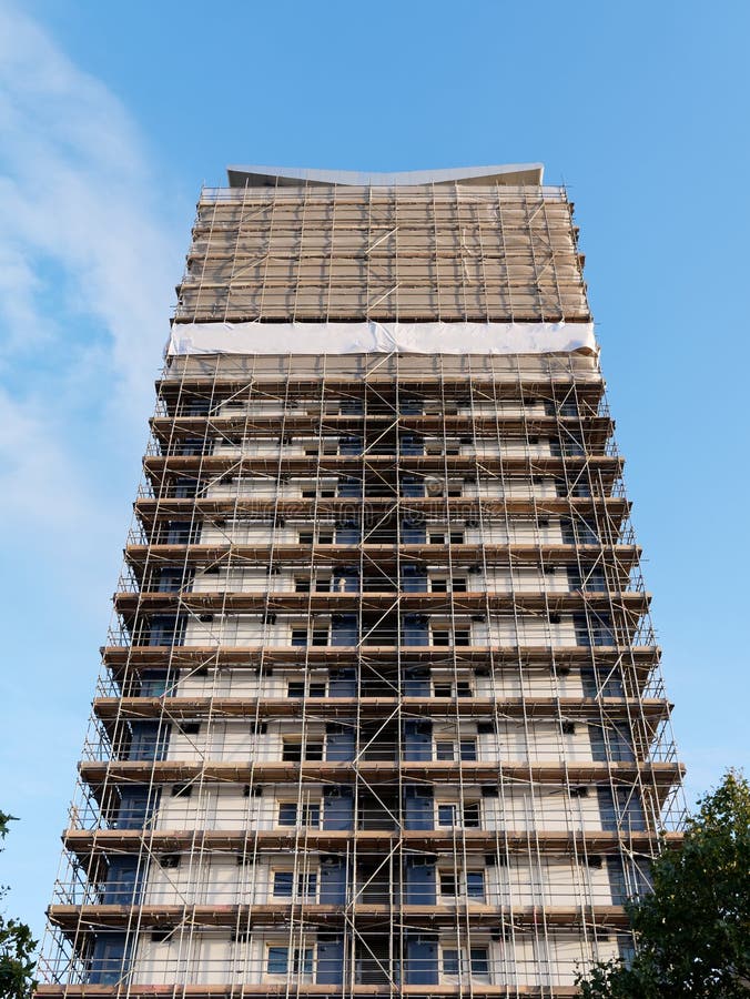 Extensive Scaffolding on a Tower Building Stock Photo - Image of blue ...