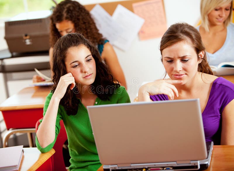 Students: Teens Doing Research Together on Laptop Stock Photo - Image ...