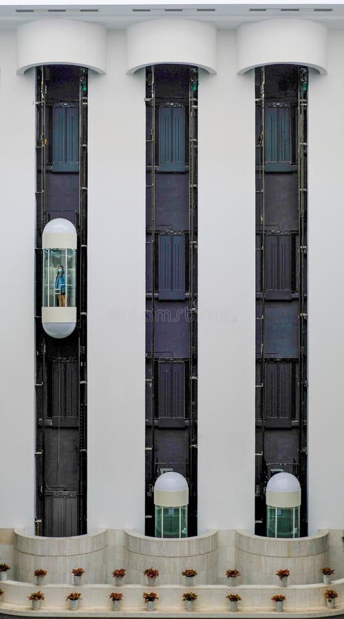 Exterior of a Building with Capsule Elevator Stock Photo - Image of ...