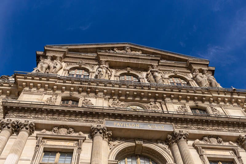 The Exterior of a Building with an Elaborate Balcony and Windows Stock ...