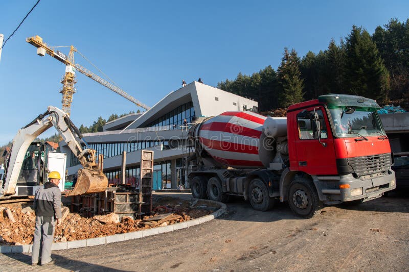 The Exterior of a Business Building Under Construction is Surrounded by ...